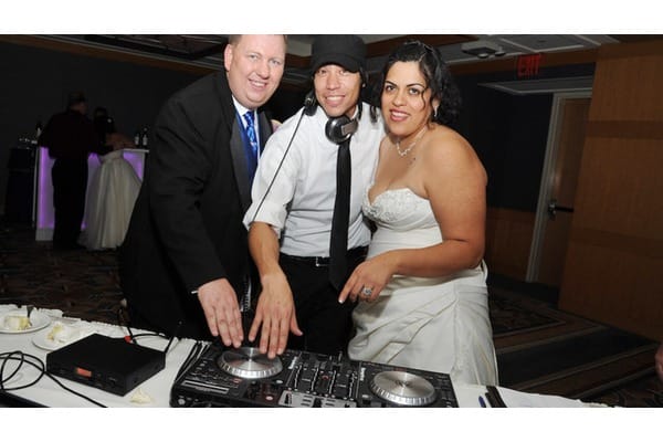 DJ vs Live Band for Weddings: Crafting the Perfect Playlist